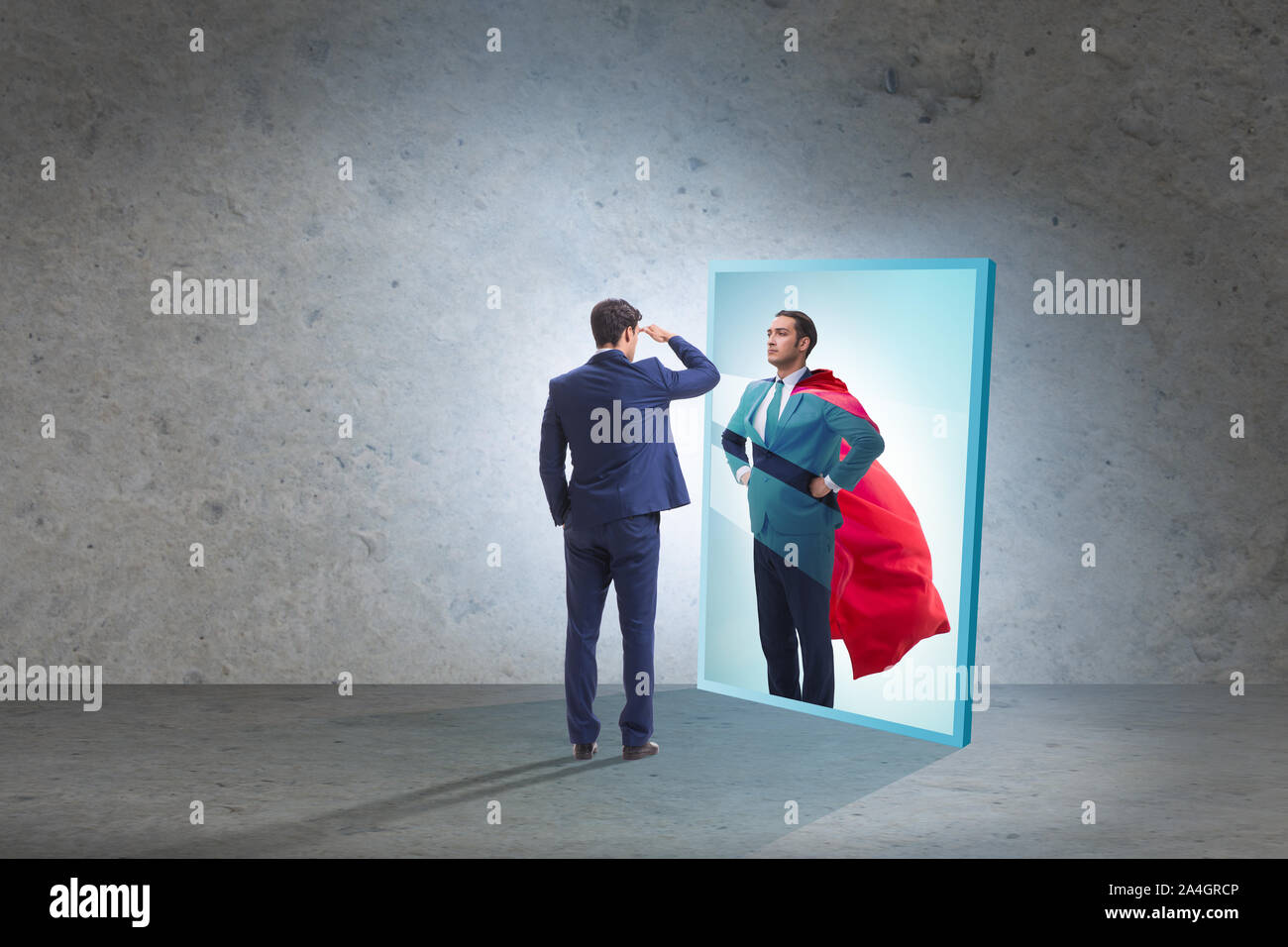 The businessman seeing himself in mirror as superhero Stock Photo - Alamy