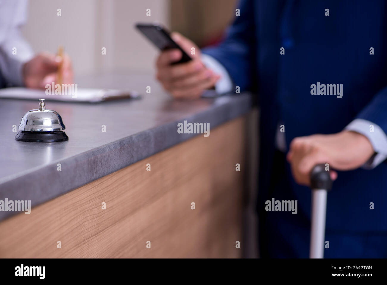 The hotel reception bell at the counter Stock Photo - Alamy
