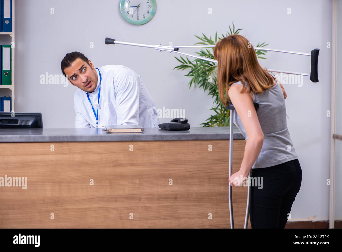 The young patient at the reception in the hospital Stock Photo - Alamy