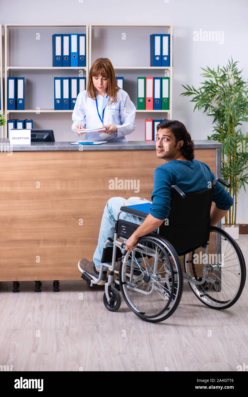 The young patient at the reception in the hospital Stock Photo - Alamy