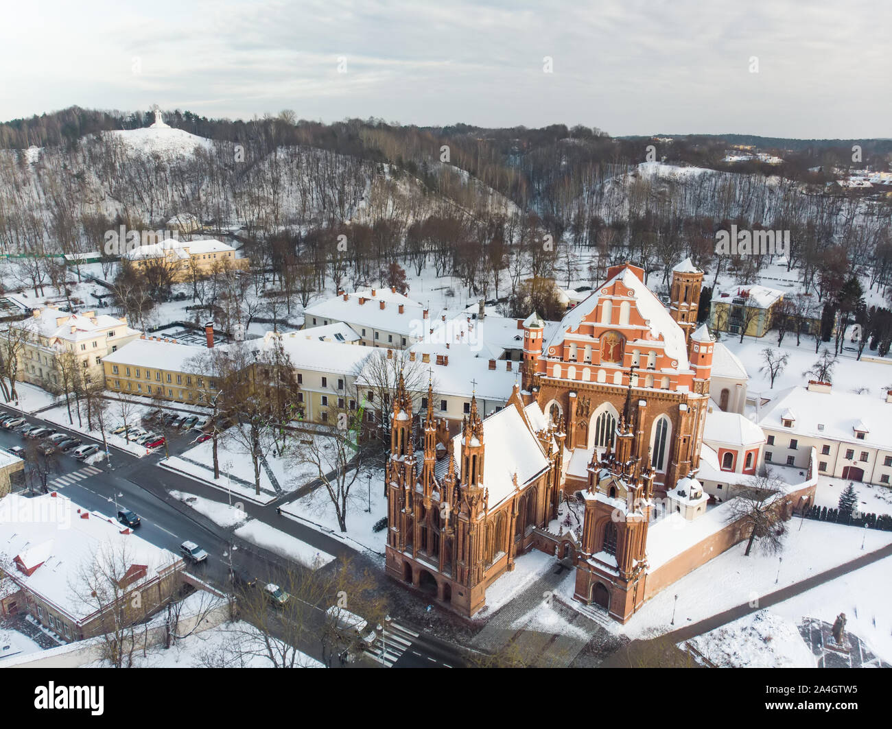Beautiful Vilnius city panorama in winter with snow covered houses ...
