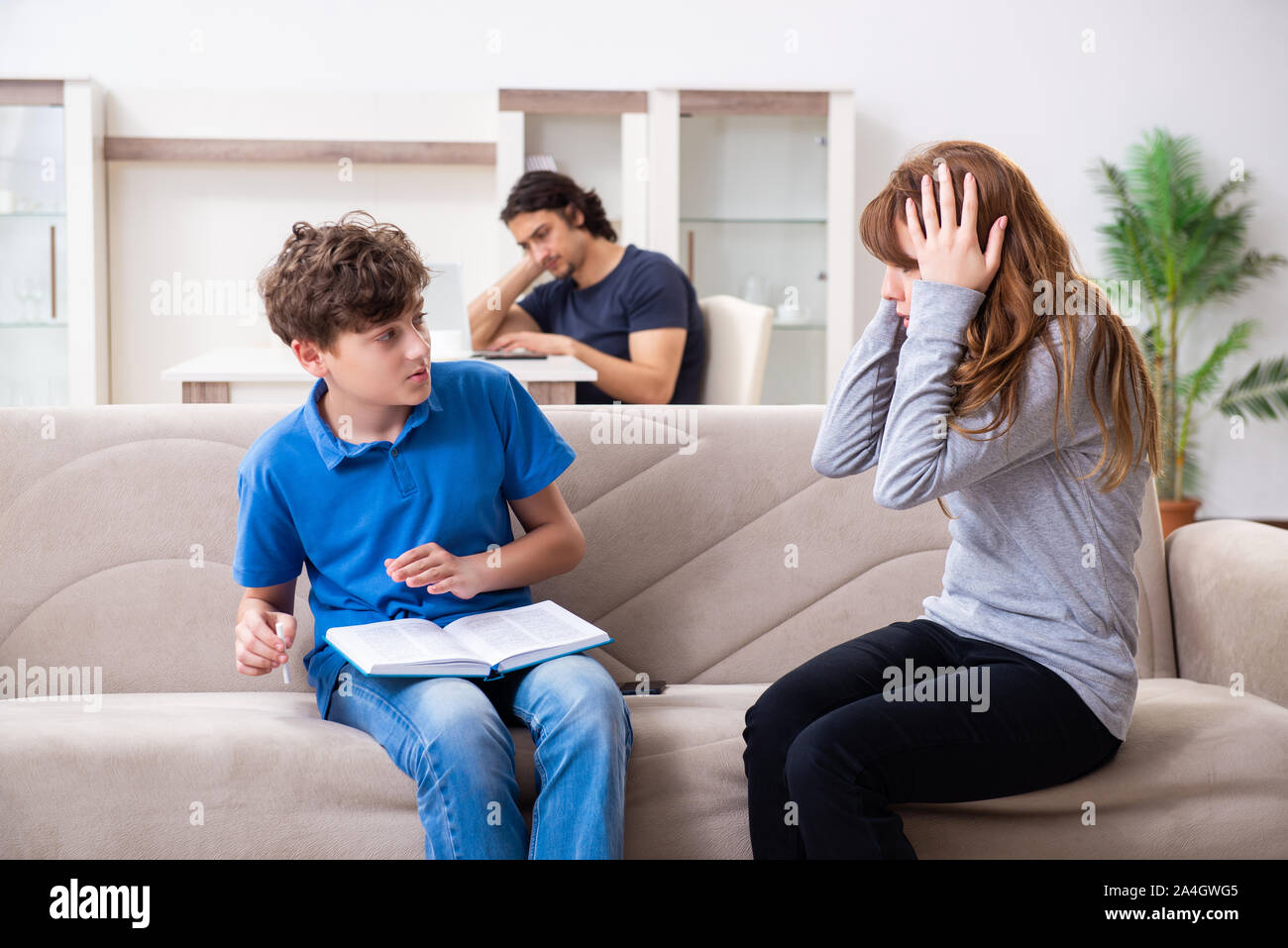 The concept of underage smoking with young boy and family Stock Photo ...