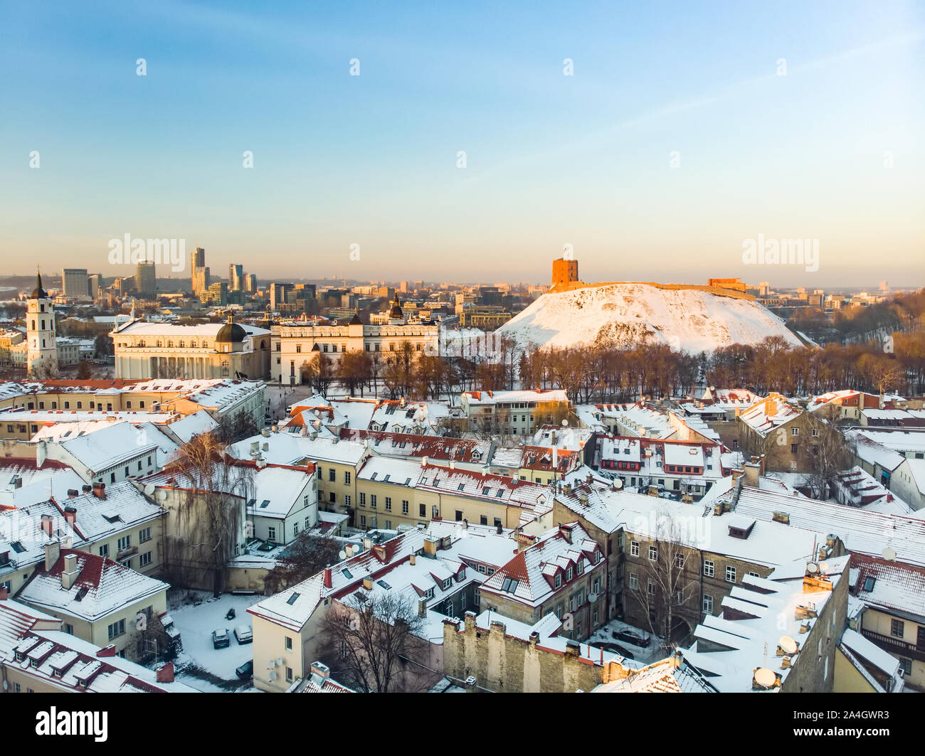 Beautiful Vilnius city panorama in winter with snow covered houses ...