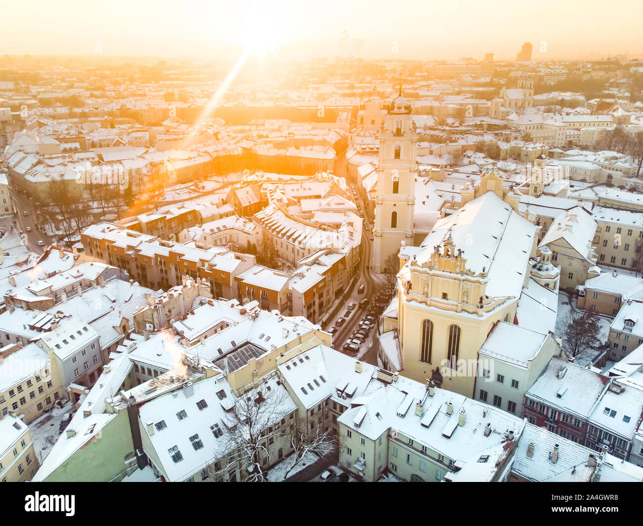 Beautiful Vilnius city panorama in winter with snow covered houses ...