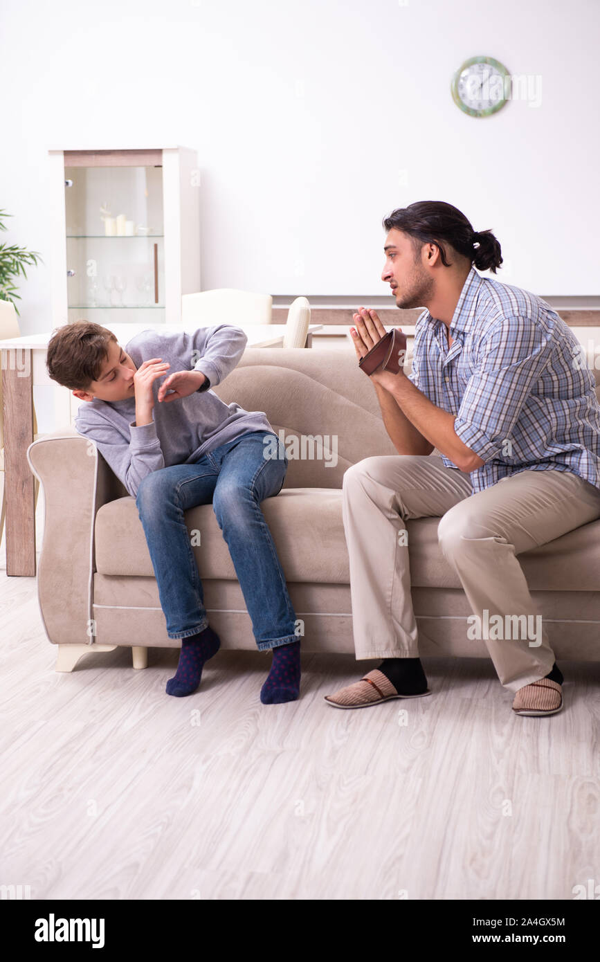 The father beating and punishing his sone Stock Photo - Alamy
