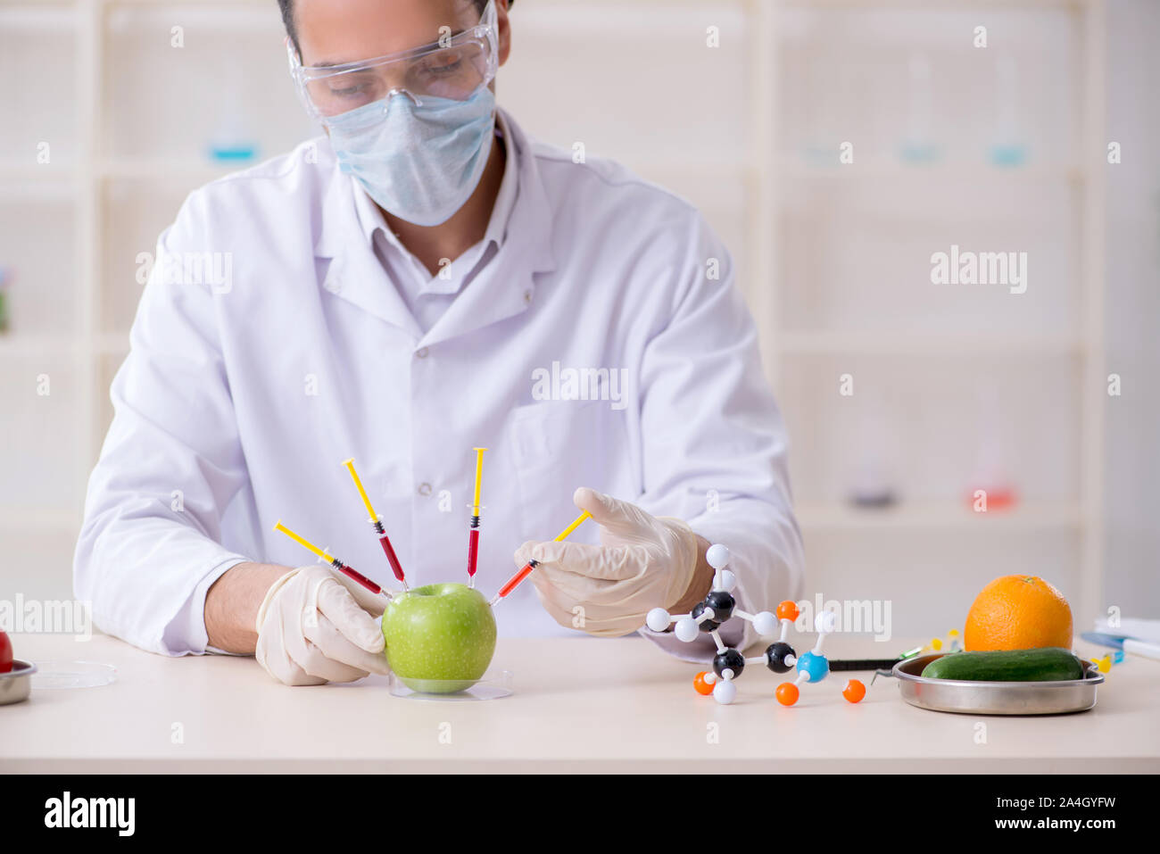 The male nutrition expert testing food products in lab Stock Photo - Alamy