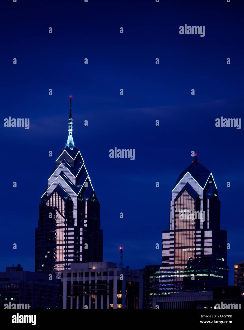 Twin towers of Liberty Place, photographed here at dusk, rose in 1987 ...