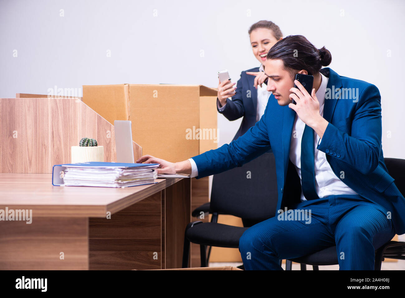 The two employees being fired from their work Stock Photo - Alamy