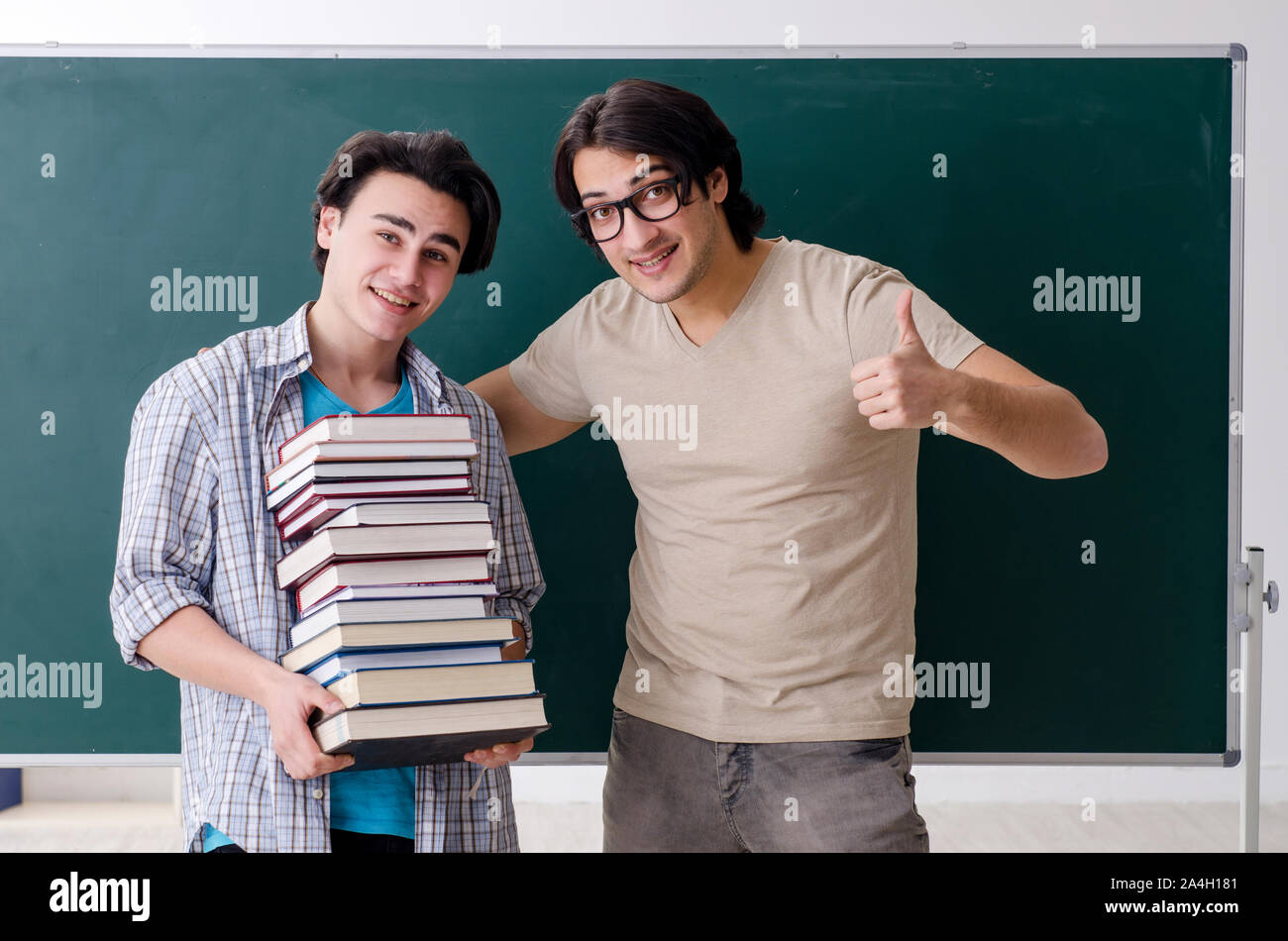 The two male students in the classroom Stock Photo - Alamy