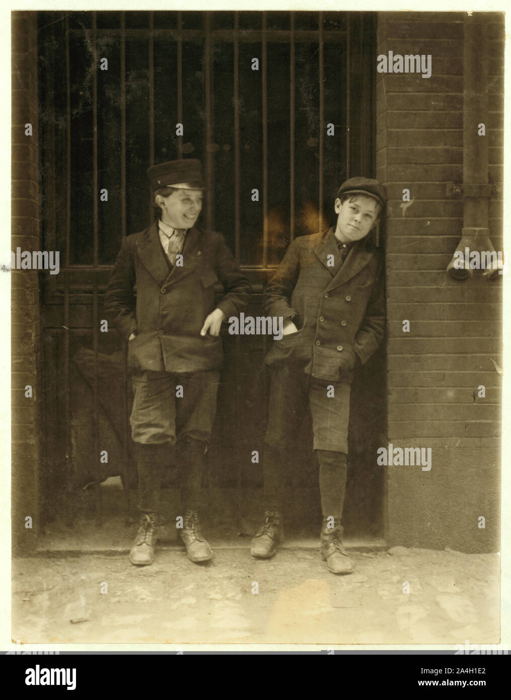 Two boys working in Inland Type Foundry 12th & Locust Sts. Work 9 to 10 ...