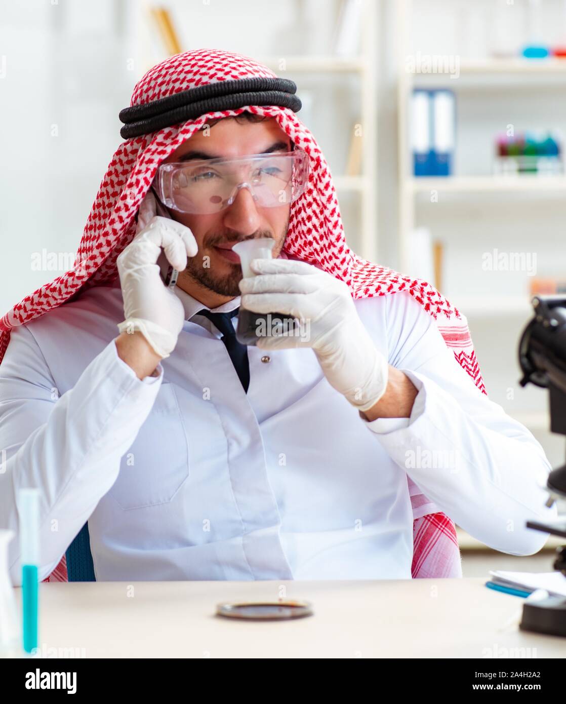 Muslim scientist at work hi-res stock photography and images - Alamy