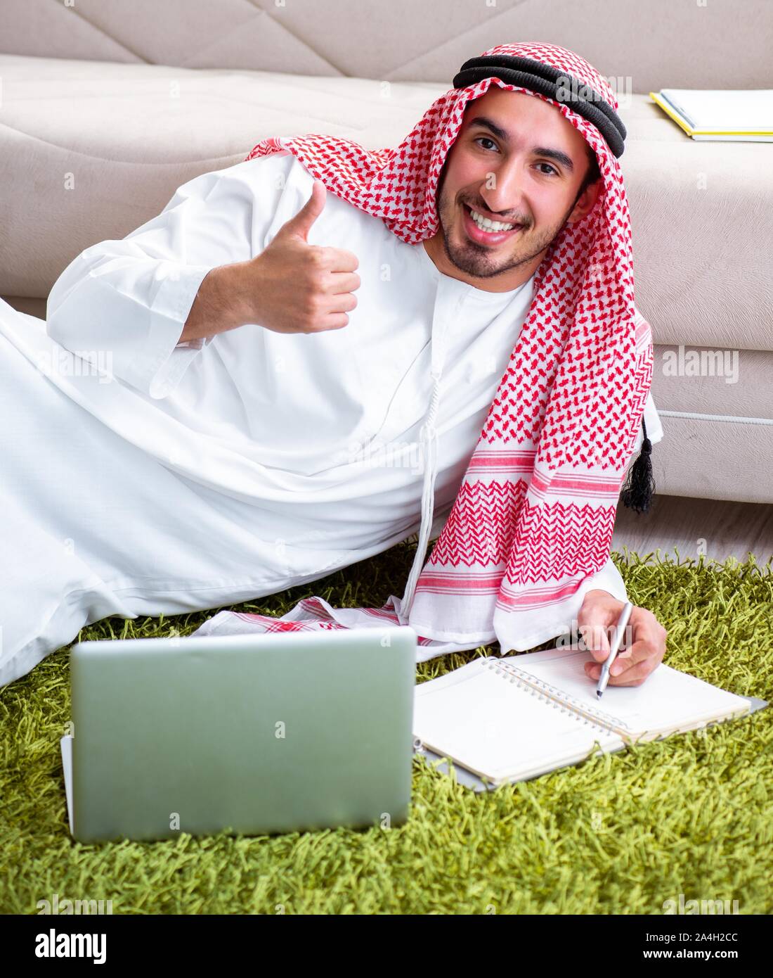 The arab man working at home on his work Stock Photo - Alamy