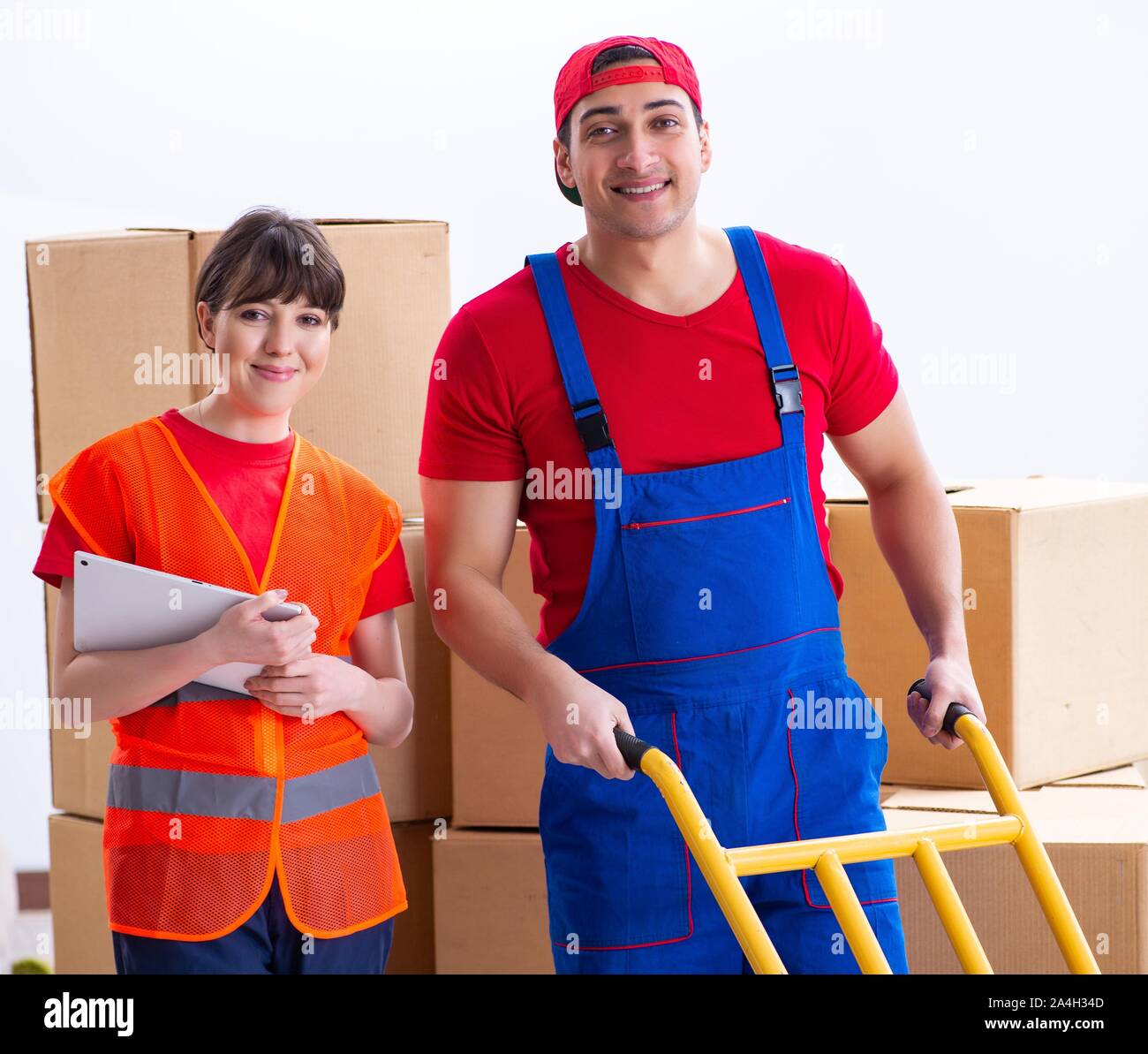 The professional movers doing home relocation Stock Photo - Alamy