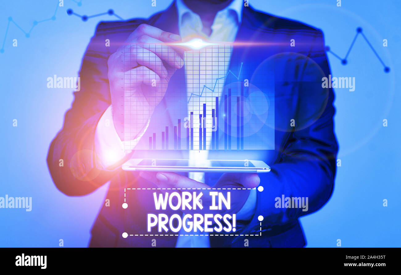 Writing note showing Work In Progress. Business concept for unfinished ...