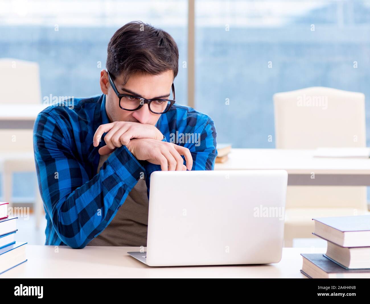Student in telelearning distance learning concept reading in library ...