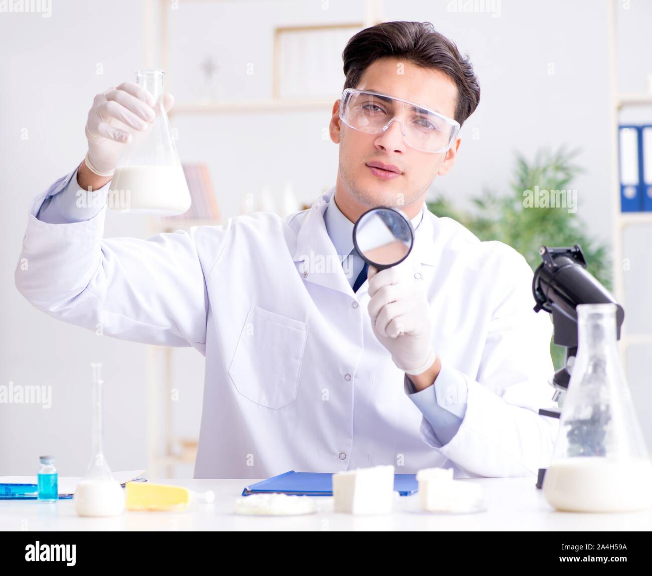 Food scientist testing new stuff in the lab Stock Photo - Alamy