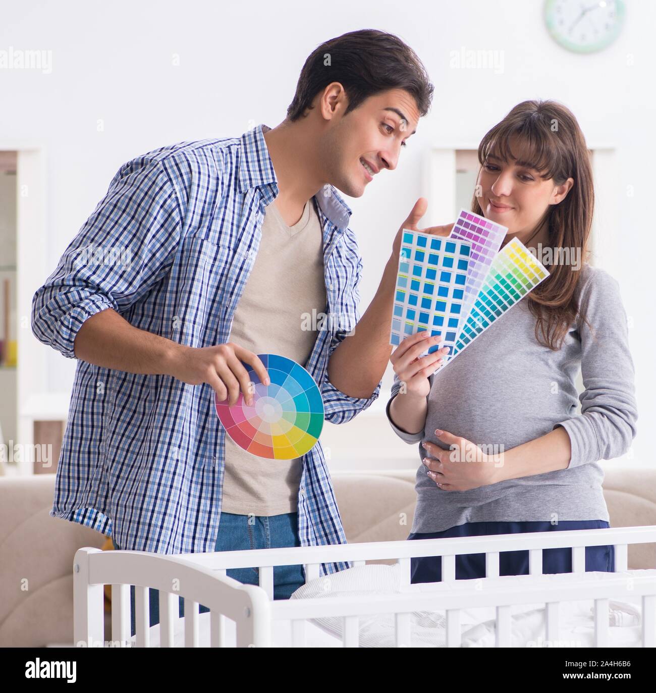 Young parents expecting their first baby Stock Photo - Alamy