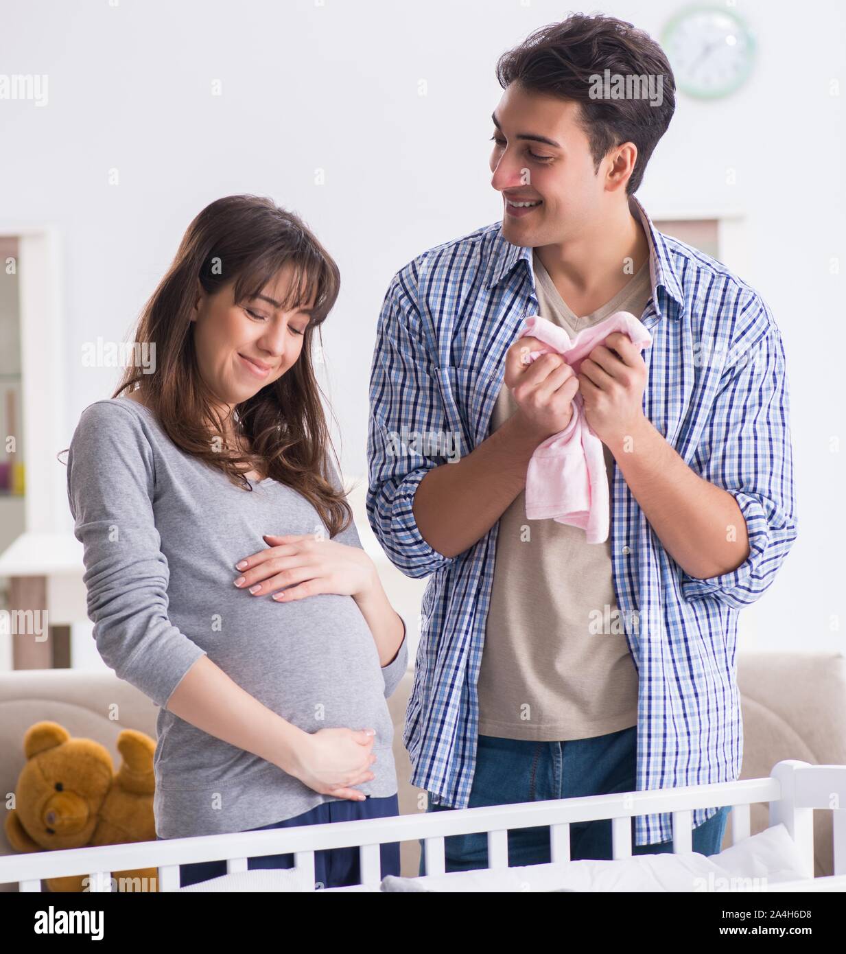 Young parents expecting their first baby Stock Photo - Alamy