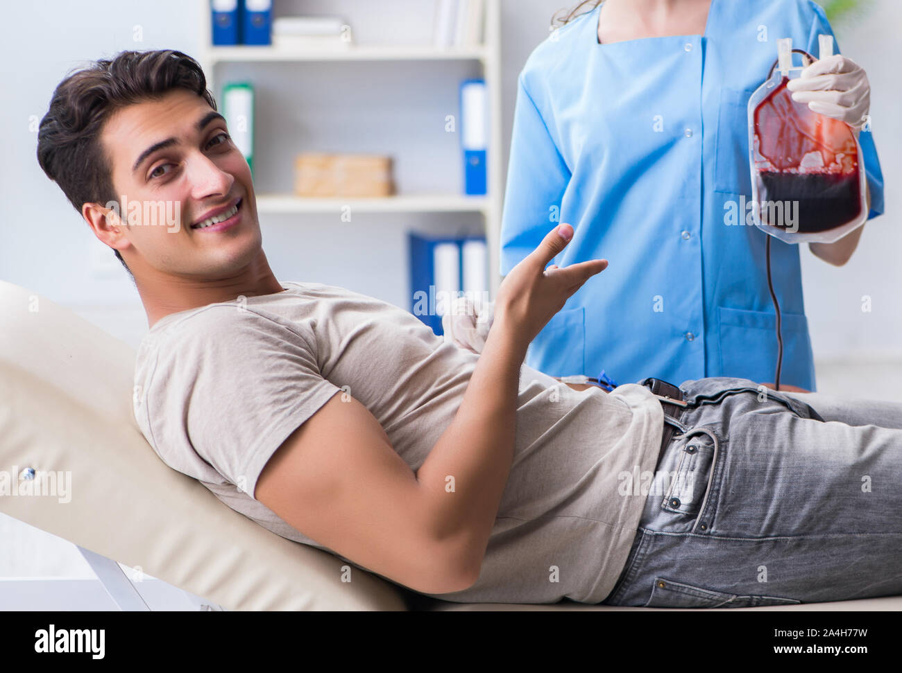 The patient getting blood transfusion in hospital clinic Stock Photo ...