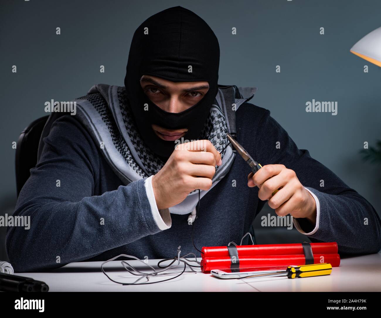 The terrorist bomber preparing dynamite bomb Stock Photo - Alamy