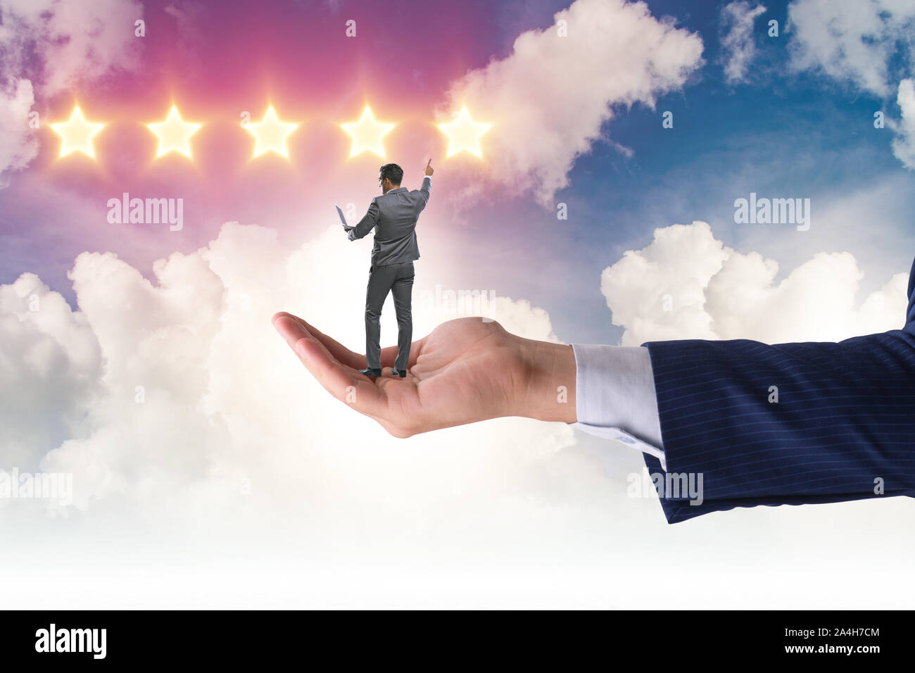 The businessman held on hand reaching out for stars Stock Photo - Alamy