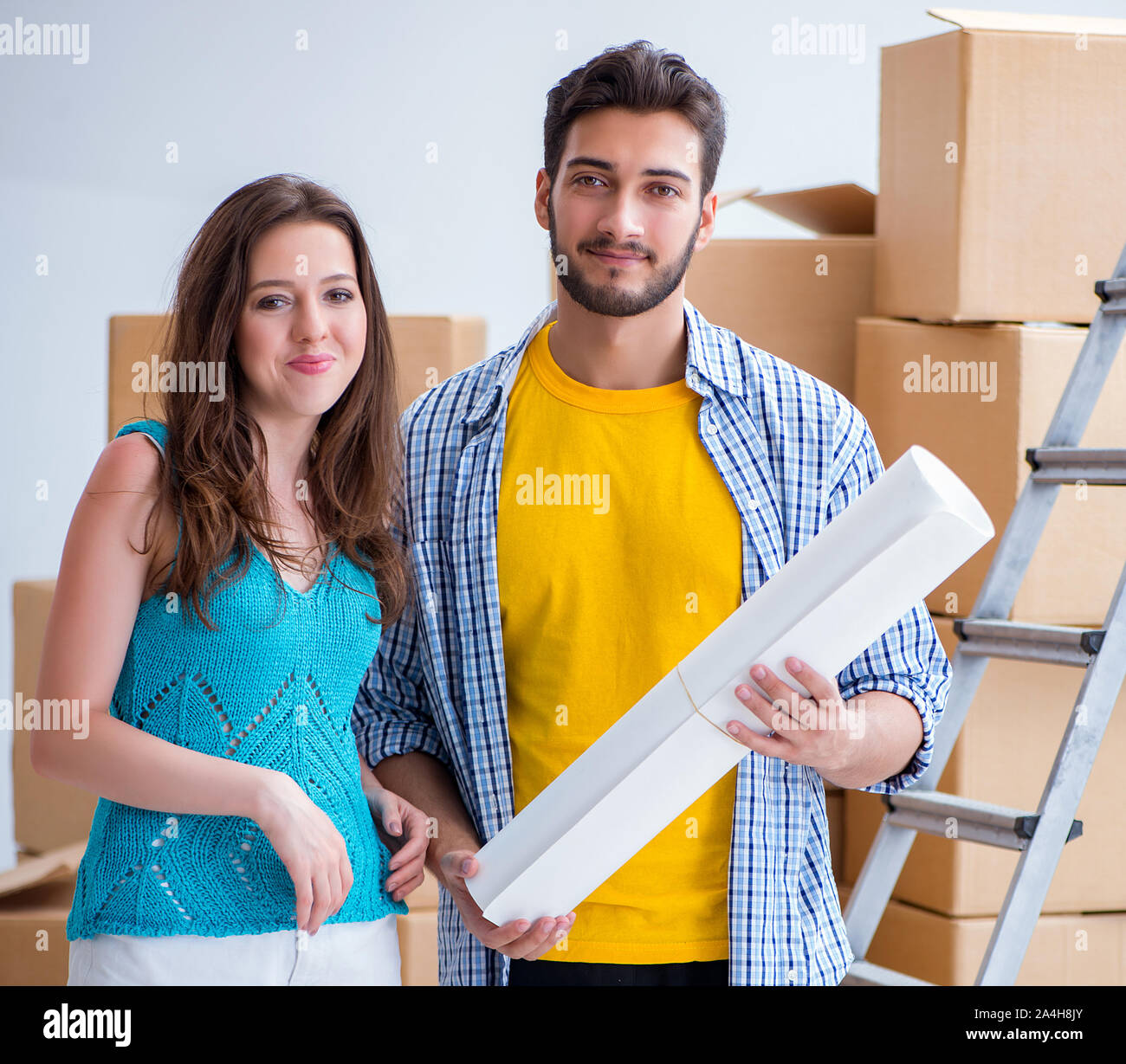 The young family planning home refurbishing in diy concept Stock Photo - Alamy