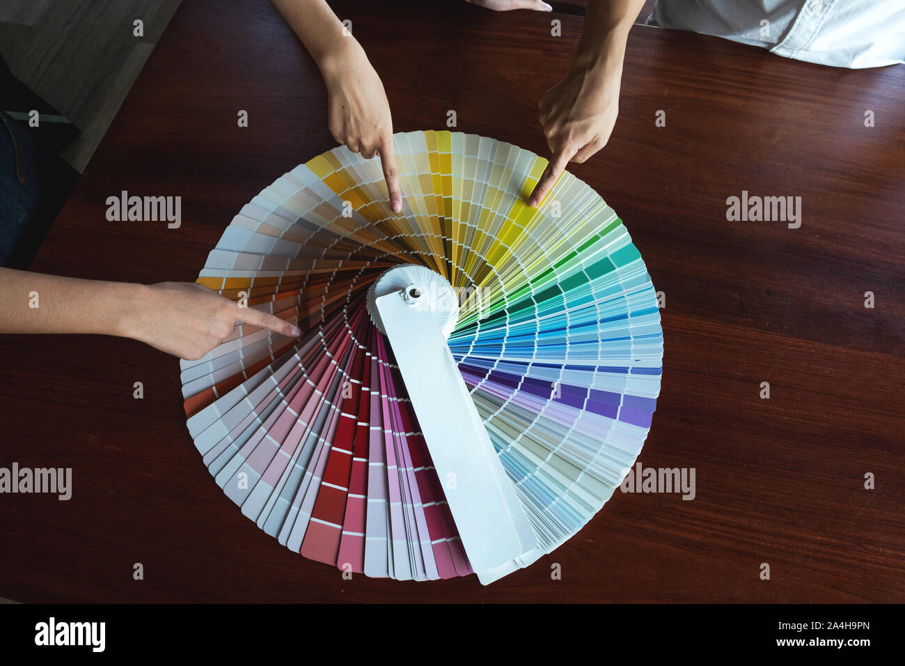 Graphic designers choose colors from the color bands samples for design ...
