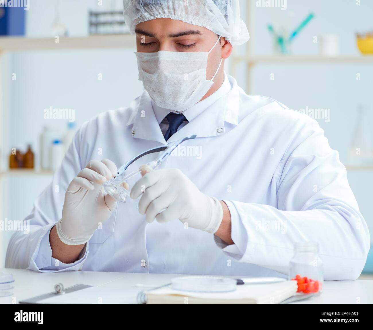 The doctor testing new drugs for medical purposes Stock Photo - Alamy