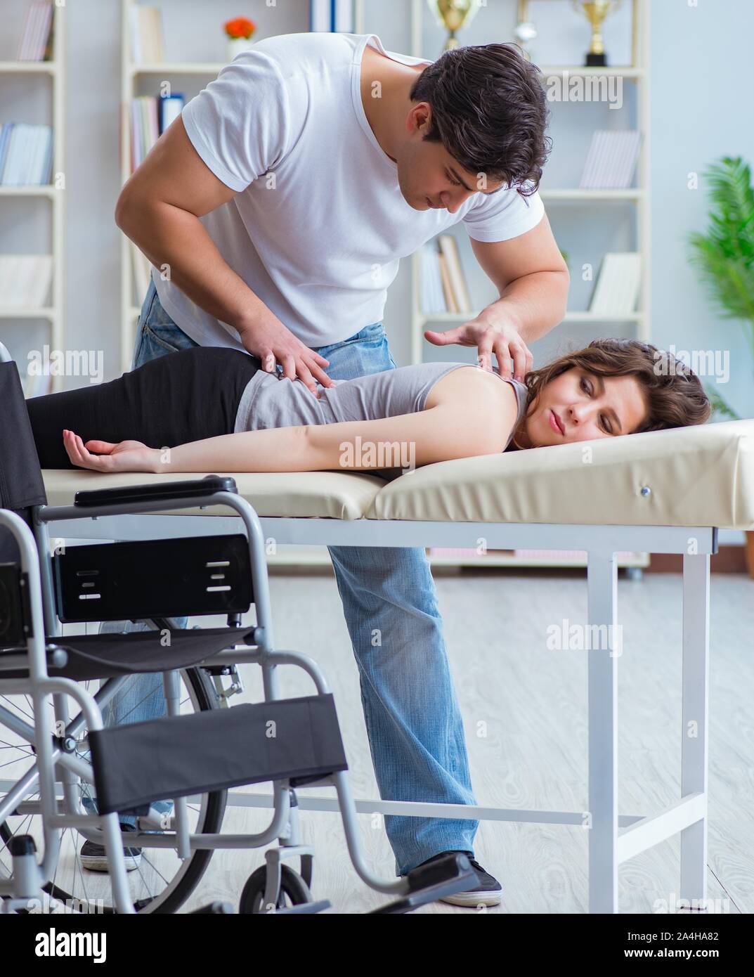 Patient undergoing rehabilitation recovery programme with doctor Stock ...