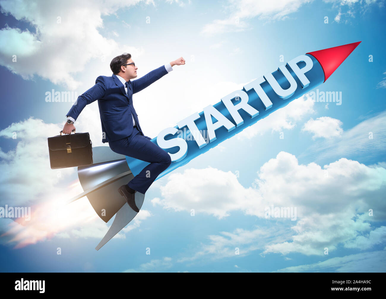 The businessman in start-up concept flying on rocket Stock Photo - Alamy