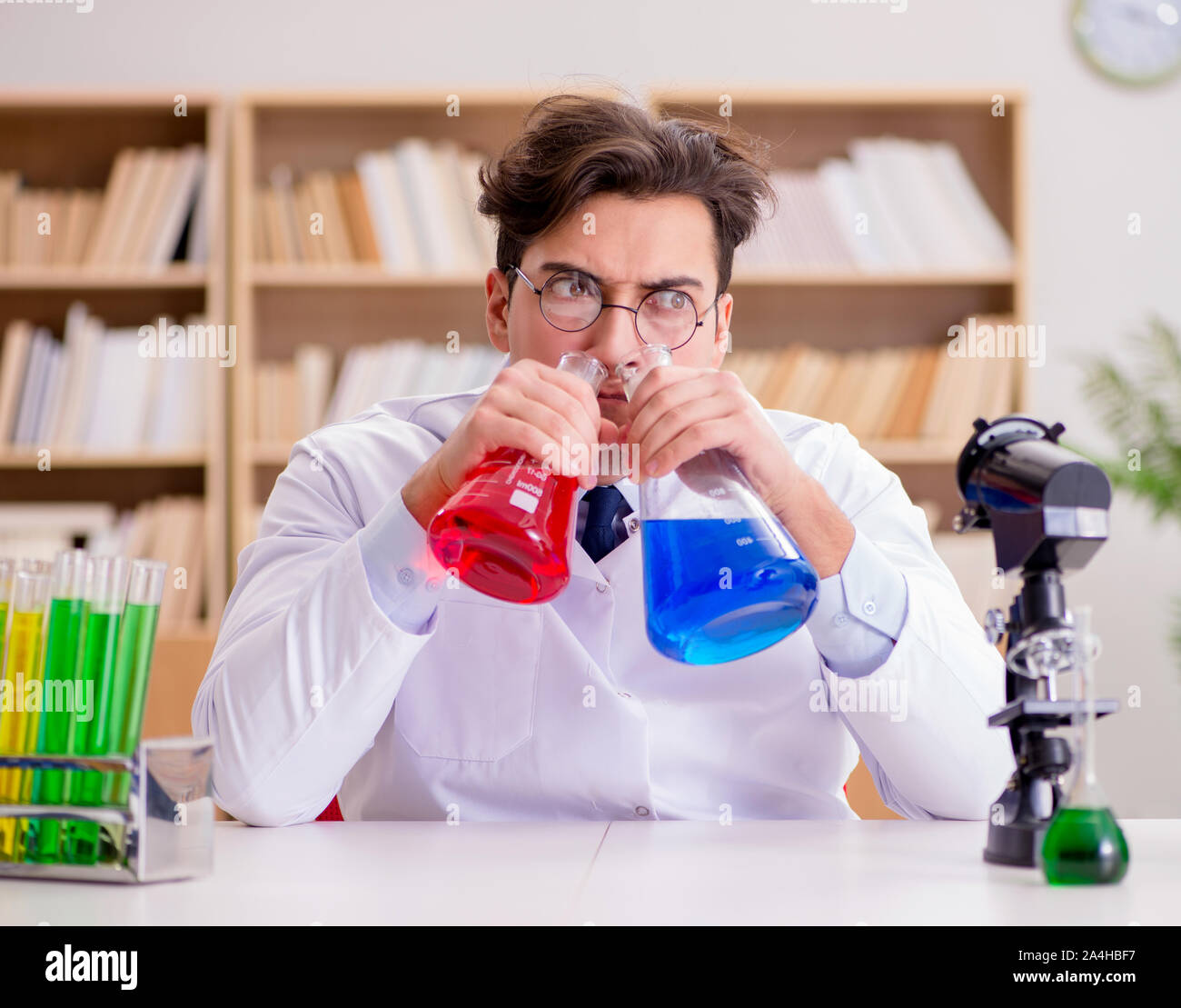 The mad crazy scientist doctor doing experiments in a laboratory Stock ...