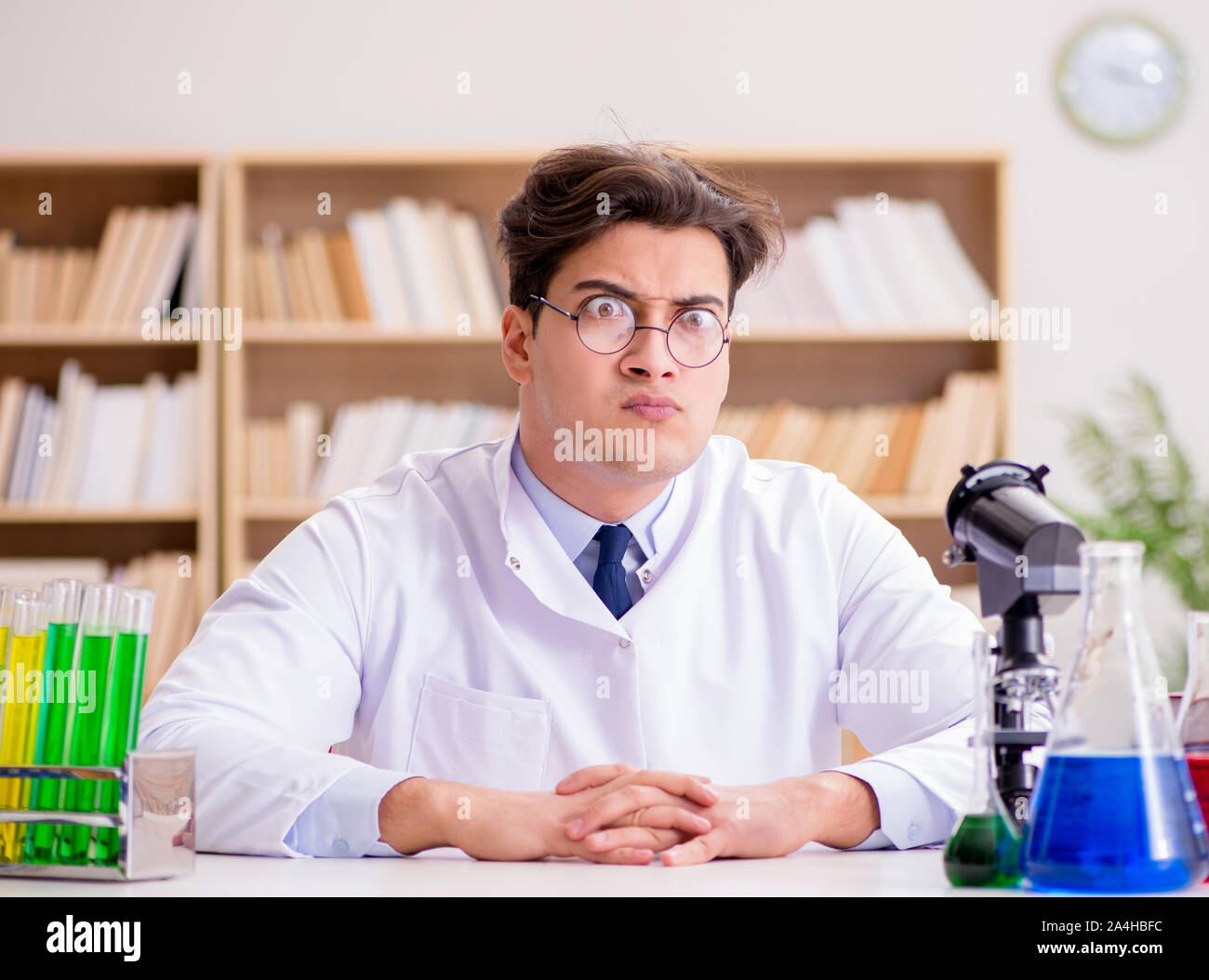 The mad crazy scientist doctor doing experiments in a laboratory Stock ...
