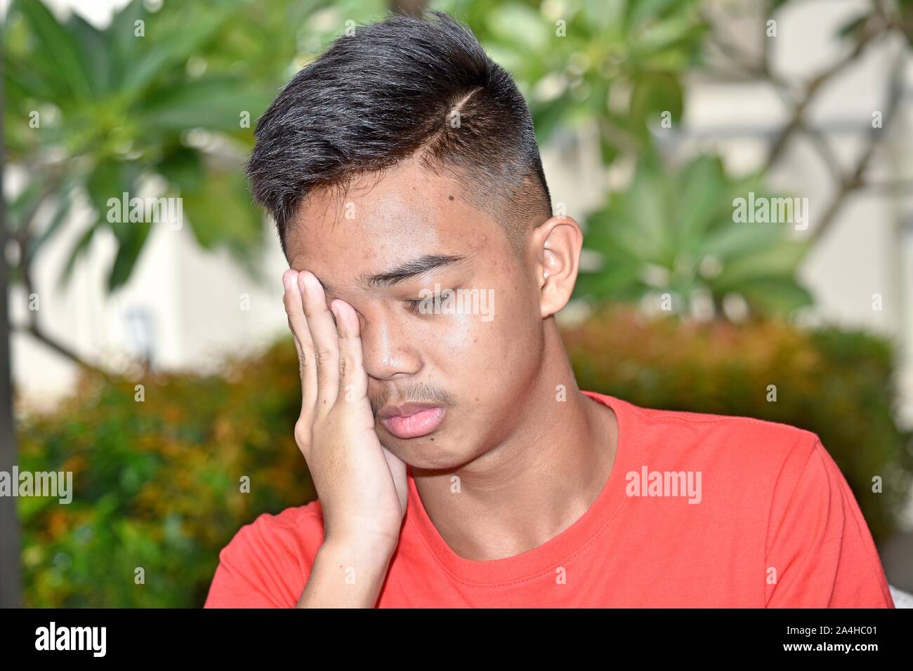 Stressful Good Looking Filipino Juvenile Stock Photo - Alamy