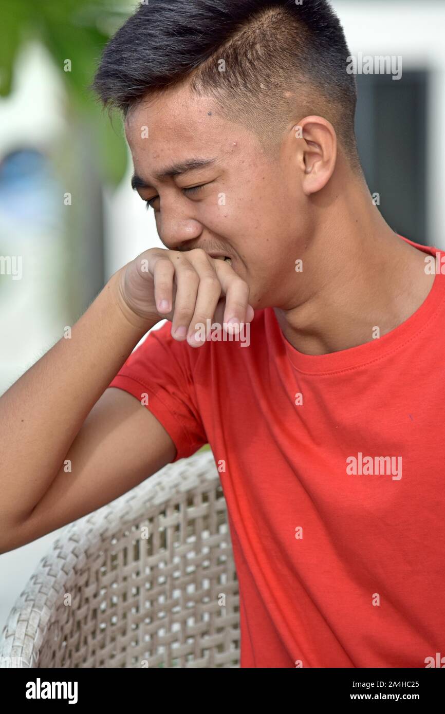An Asian Teenage Male Crying Stock Photo - Alamy