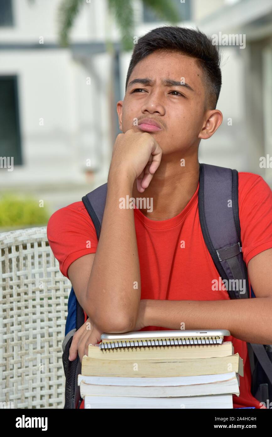 Thoughtful boy hi-res stock photography and images - Alamy