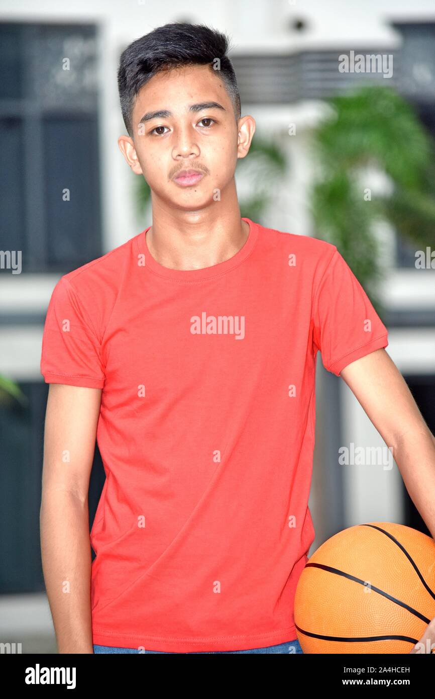 Serious Young Asian Basketball Player Stock Photo - Alamy