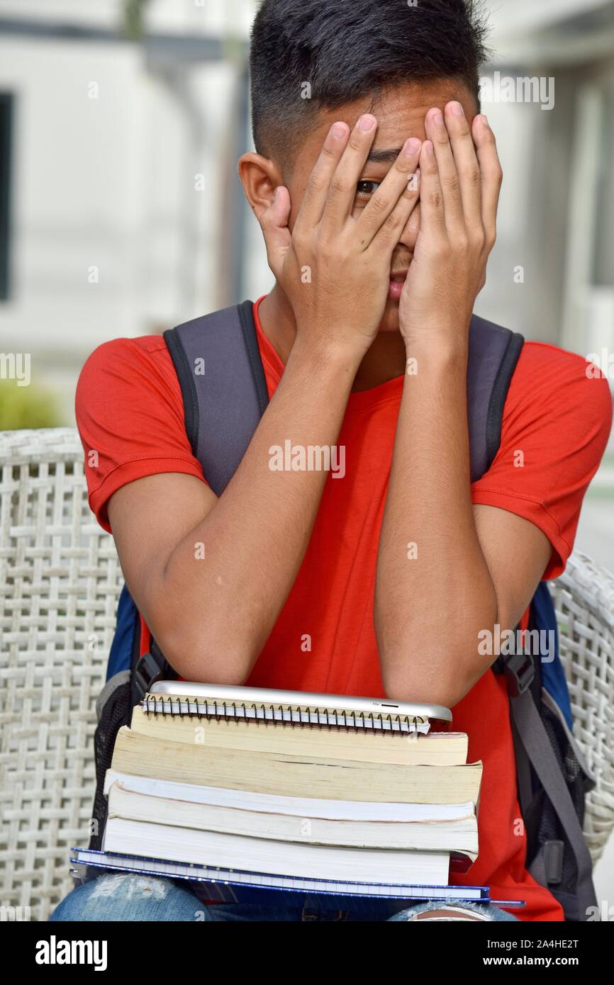 An Asian Student Afraid Stock Photo - Alamy