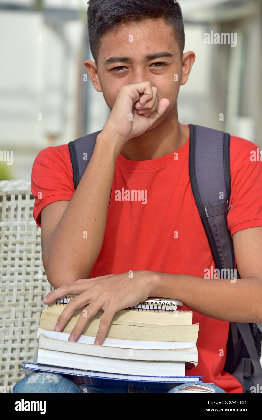 Male Student Coughing With Notebooks Stock Photo - Alamy