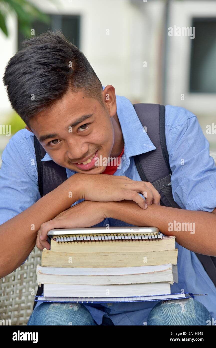 College Asian Boy Student Smiling With Notebooks Stock Photo - Alamy