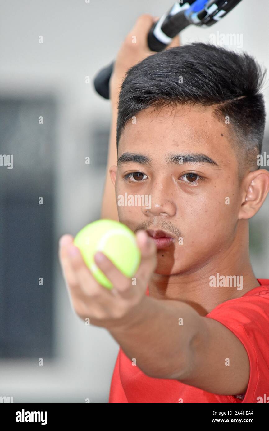 Unemotional Fit Asian Male Tennis Player Stock Photo - Alamy