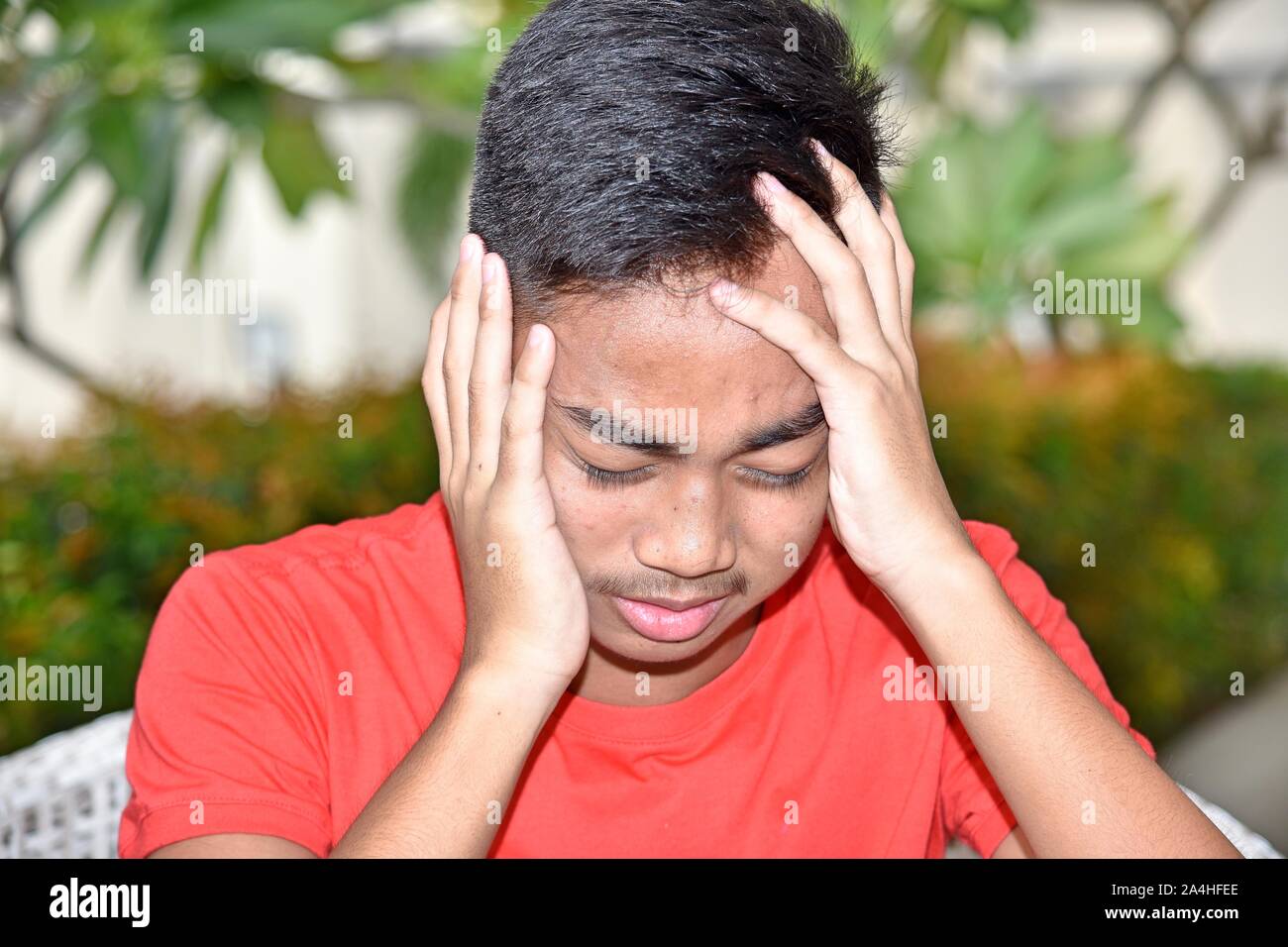 An Anxious Teenager Boy Stock Photo - Alamy