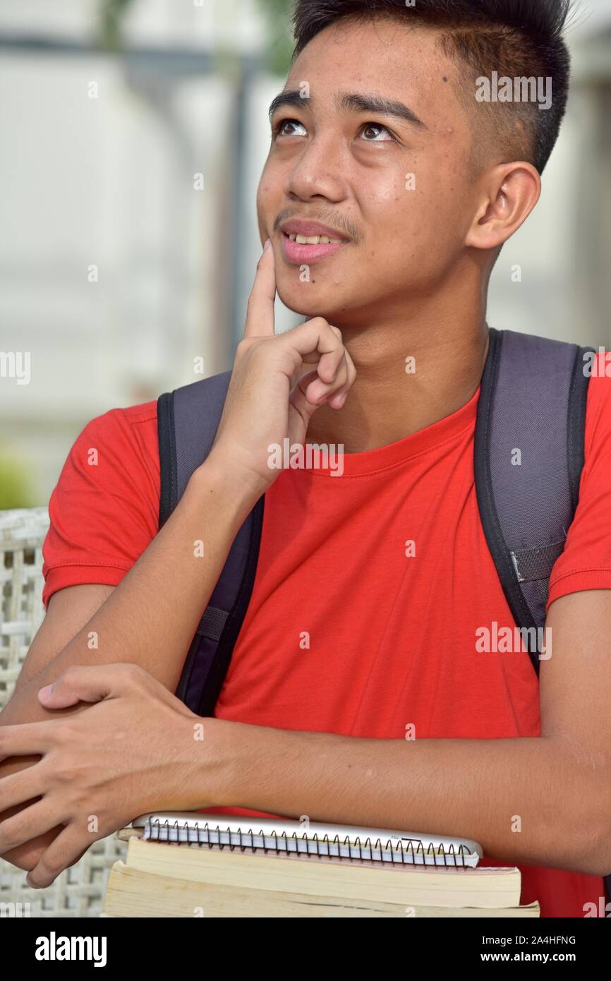 Boy Student Thinking Stock Photo - Alamy
