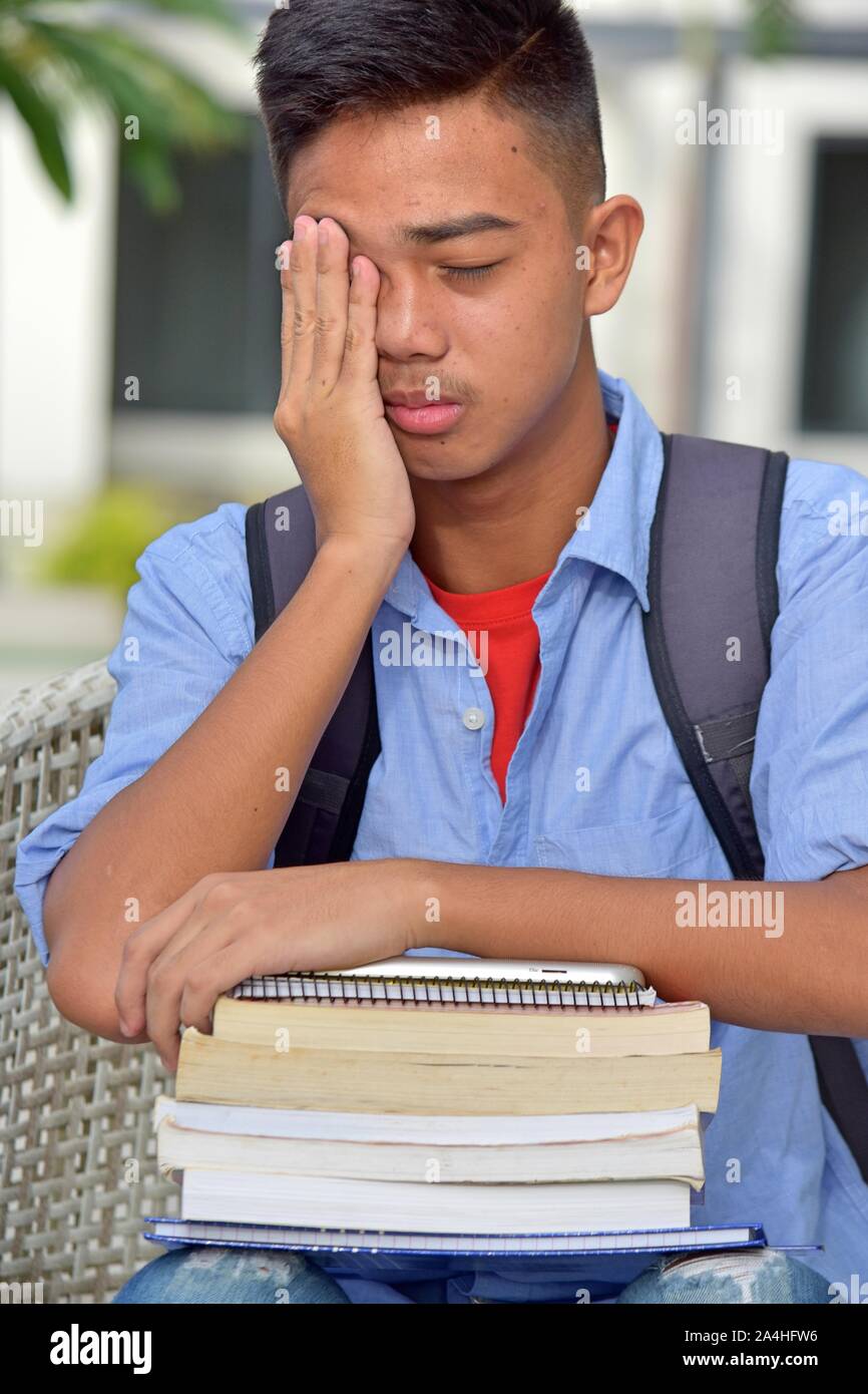 Sad male student hi-res stock photography and images - Alamy
