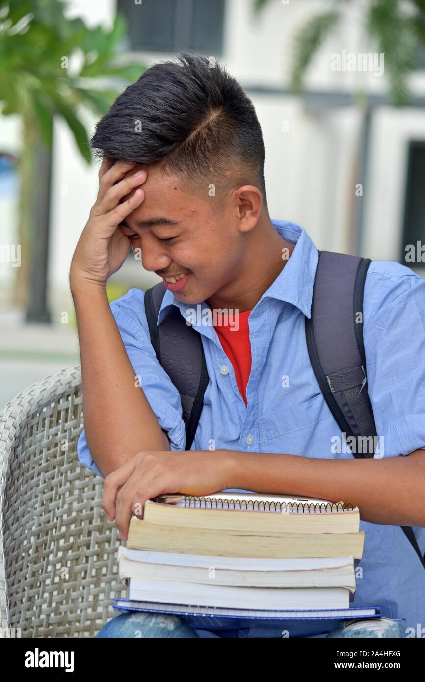 Boy Student Portrait With Books Stock Photo - Alamy