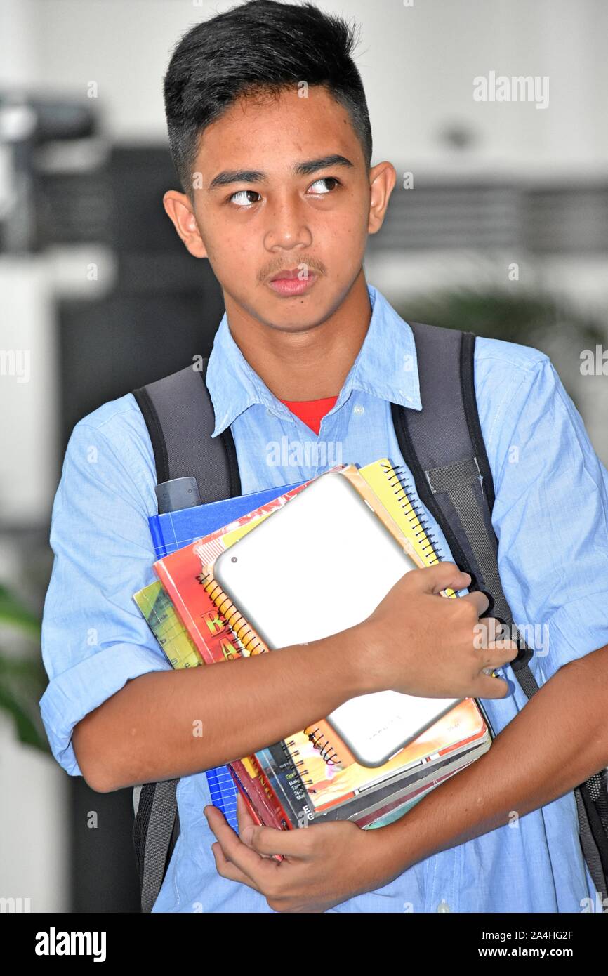 Watchful Handsome Filipino Male Student Stock Photo - Alamy