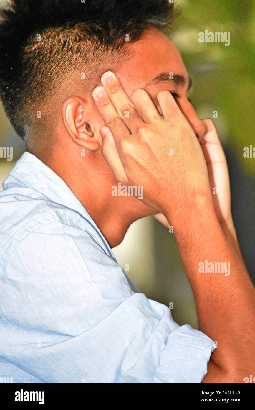 An Asian Boy Making A Decision Stock Photo - Alamy