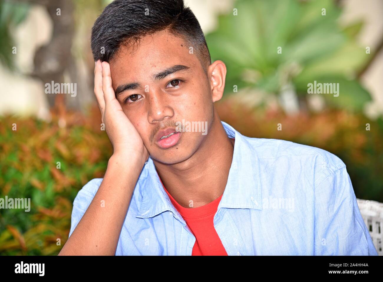 Contemplative Good Looking Filipino Person Stock Photo - Alamy