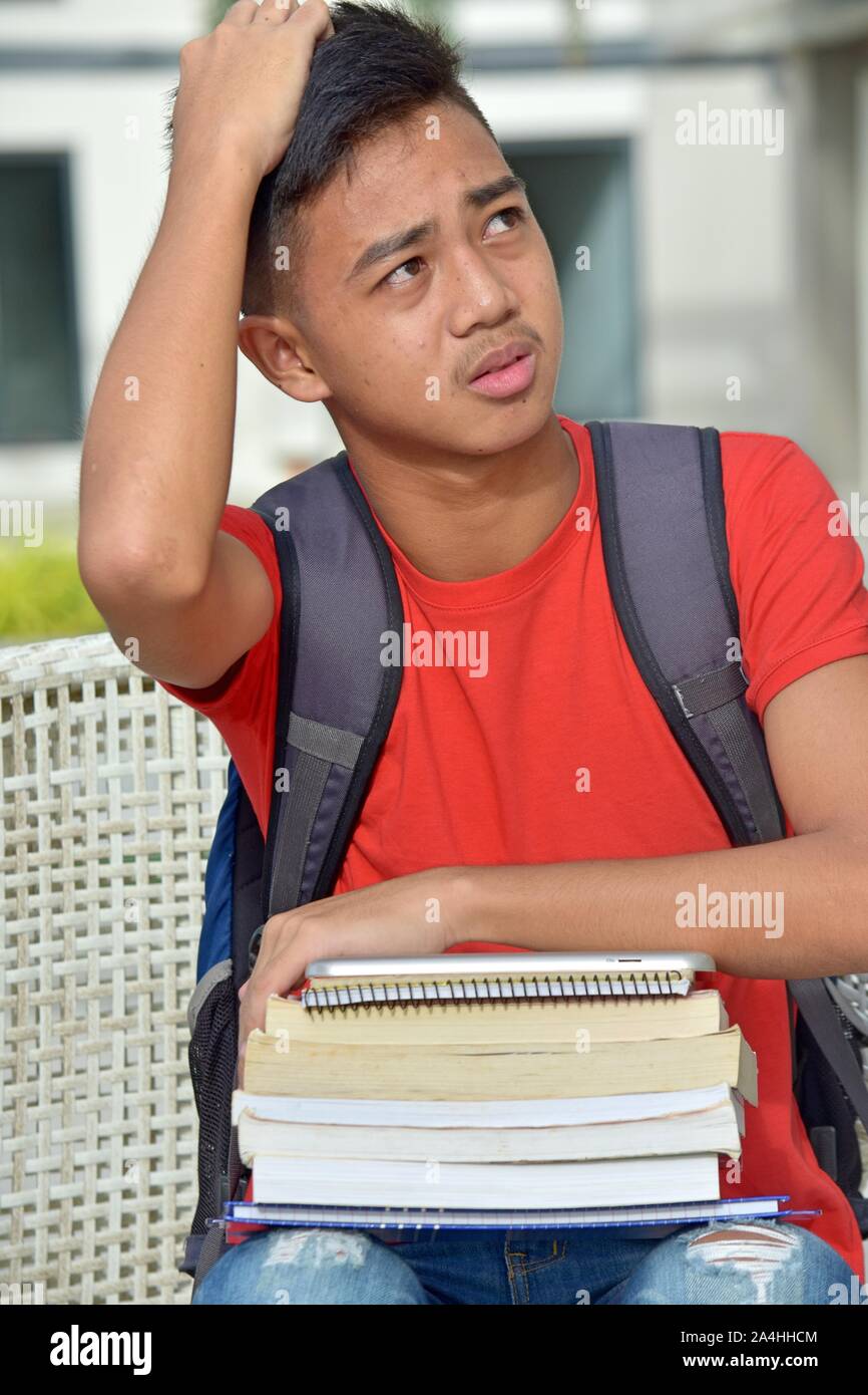 Male Student And Confusion Stock Photo - Alamy