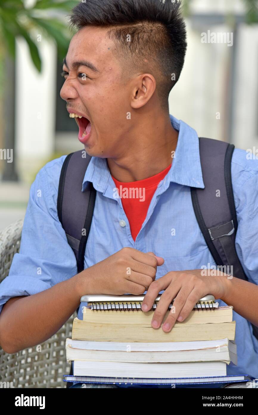 University Filipino Student Under Stress With Books Stock Photo - Alamy