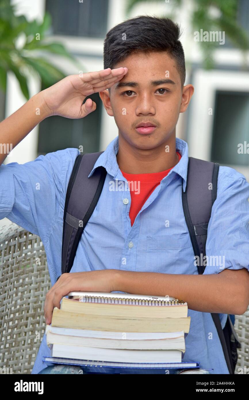 An Asian Boy Student Saluting Stock Photo - Alamy